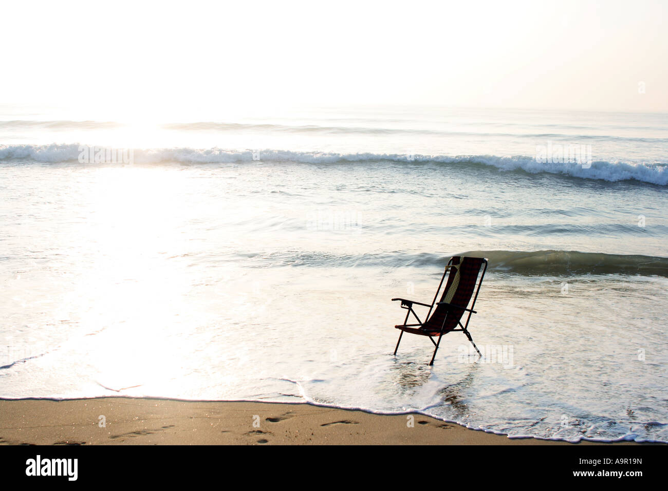 A chair in a beach Stock Photo - Alamy