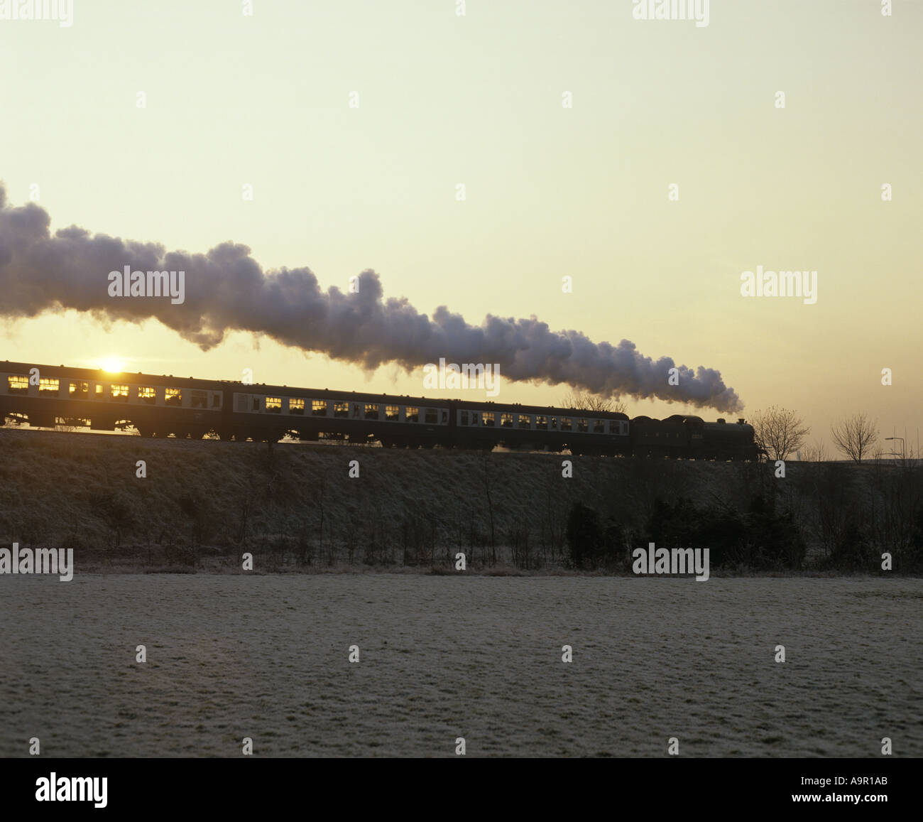 Passenger steam train sunset Edinburgh Scotland Stock Photo - Alamy