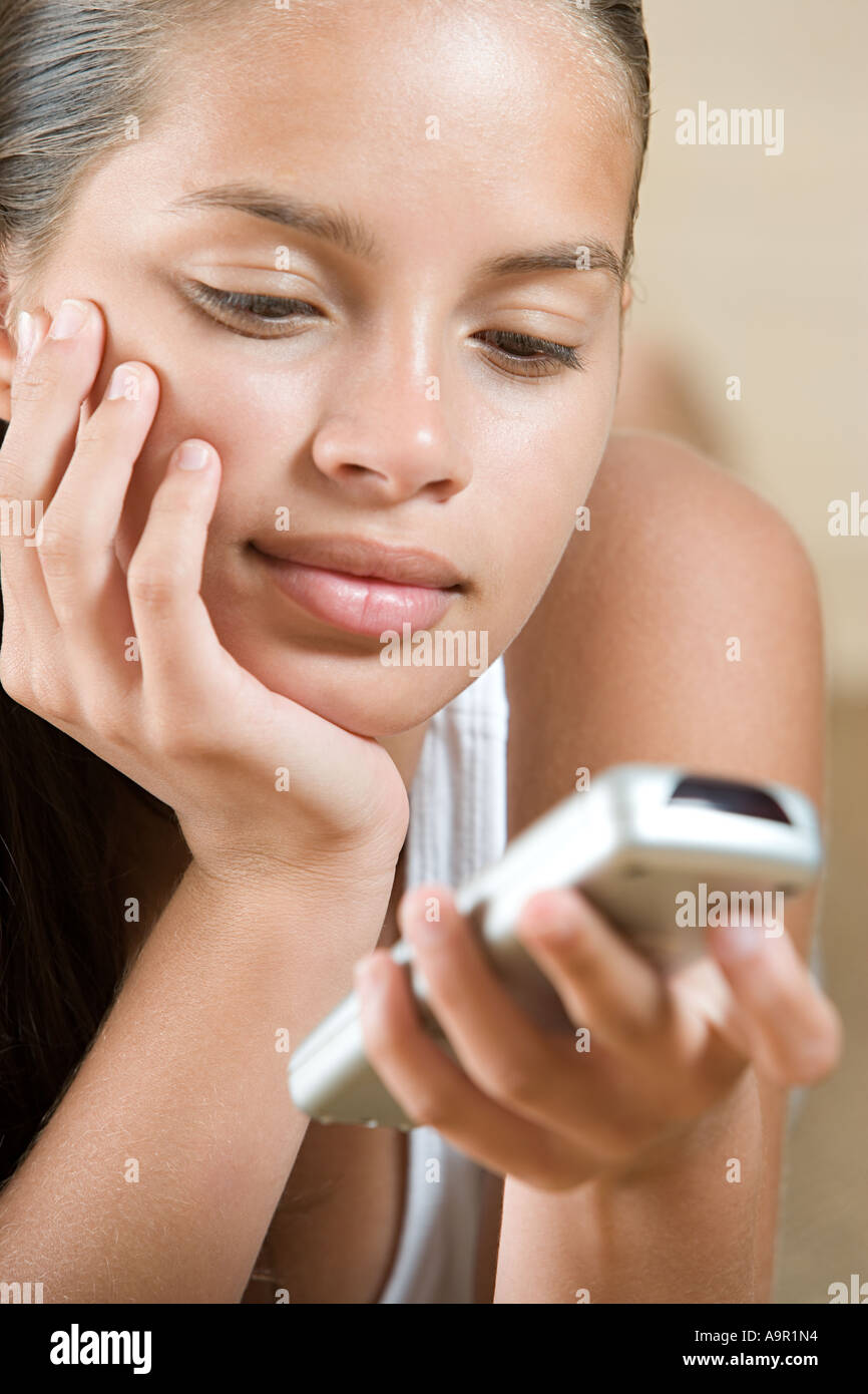 Girl with a remote control Stock Photo - Alamy