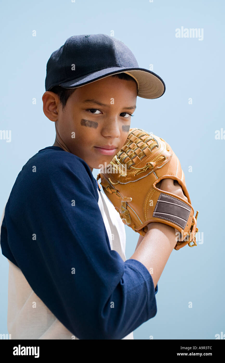 Boy in baseball clothing Stock Photo - Alamy