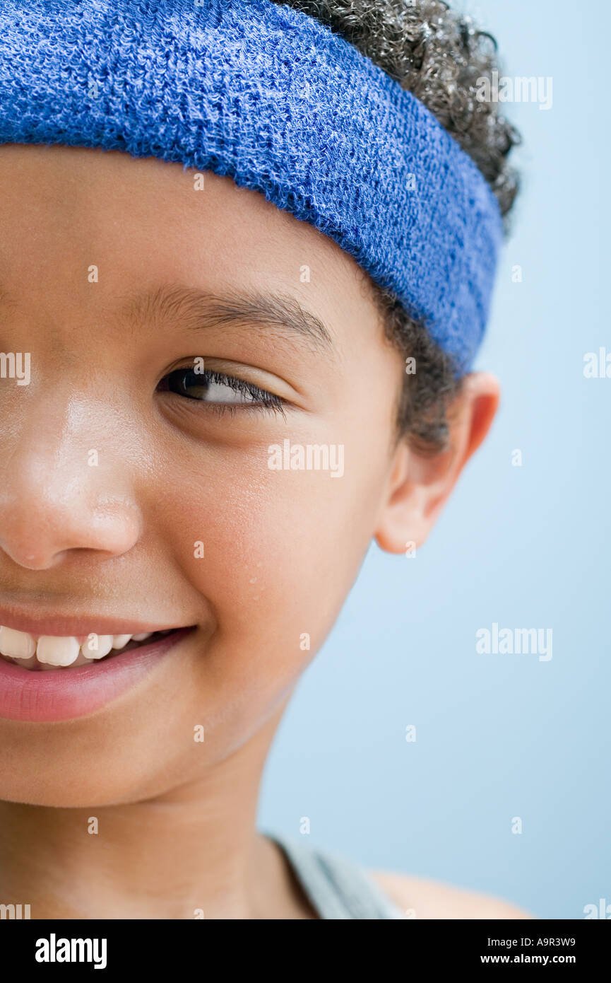 Boy perspiring wearing sports clothing Stock Photo - Alamy