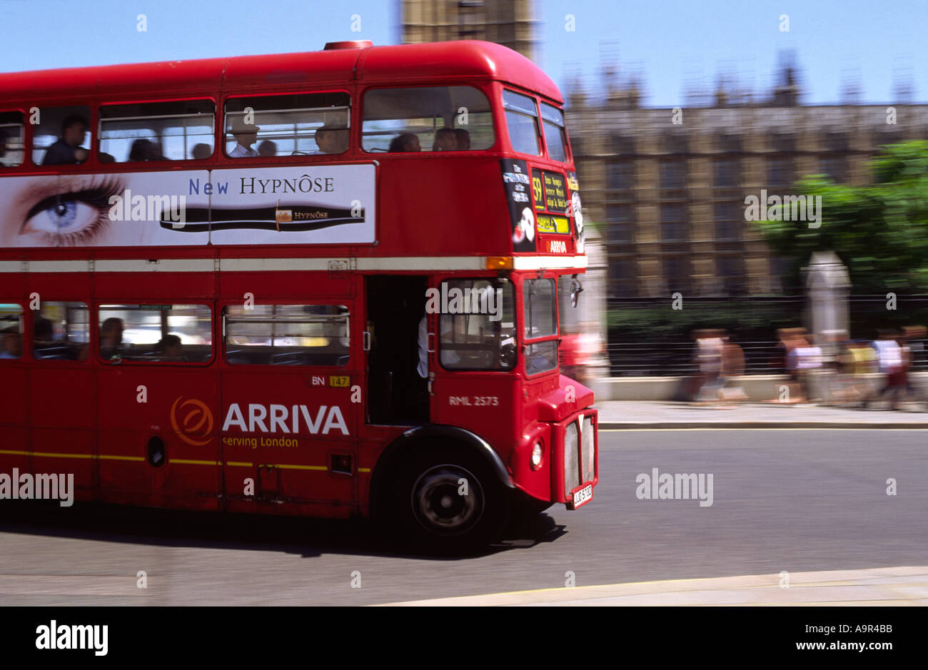 London bus driving along parliament hi-res stock photography and images ...