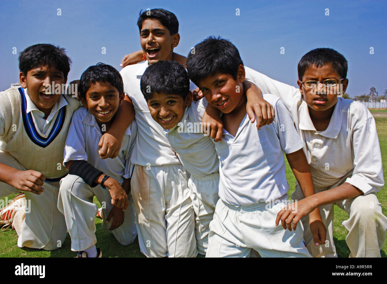 A group of young cricketers Stock Photo - Alamy