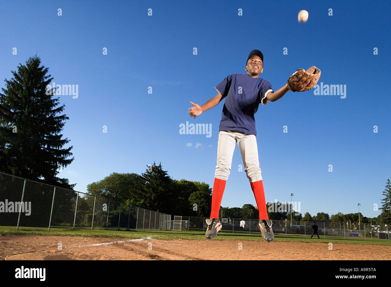 African boy baseball player hi-res stock photography and images - Alamy