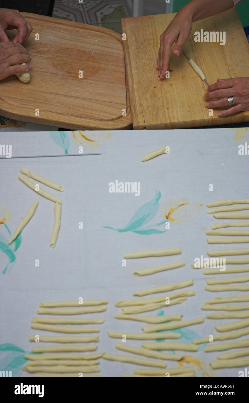 Italian mother and daughter making fresh pasta at home Stock Photo - Alamy