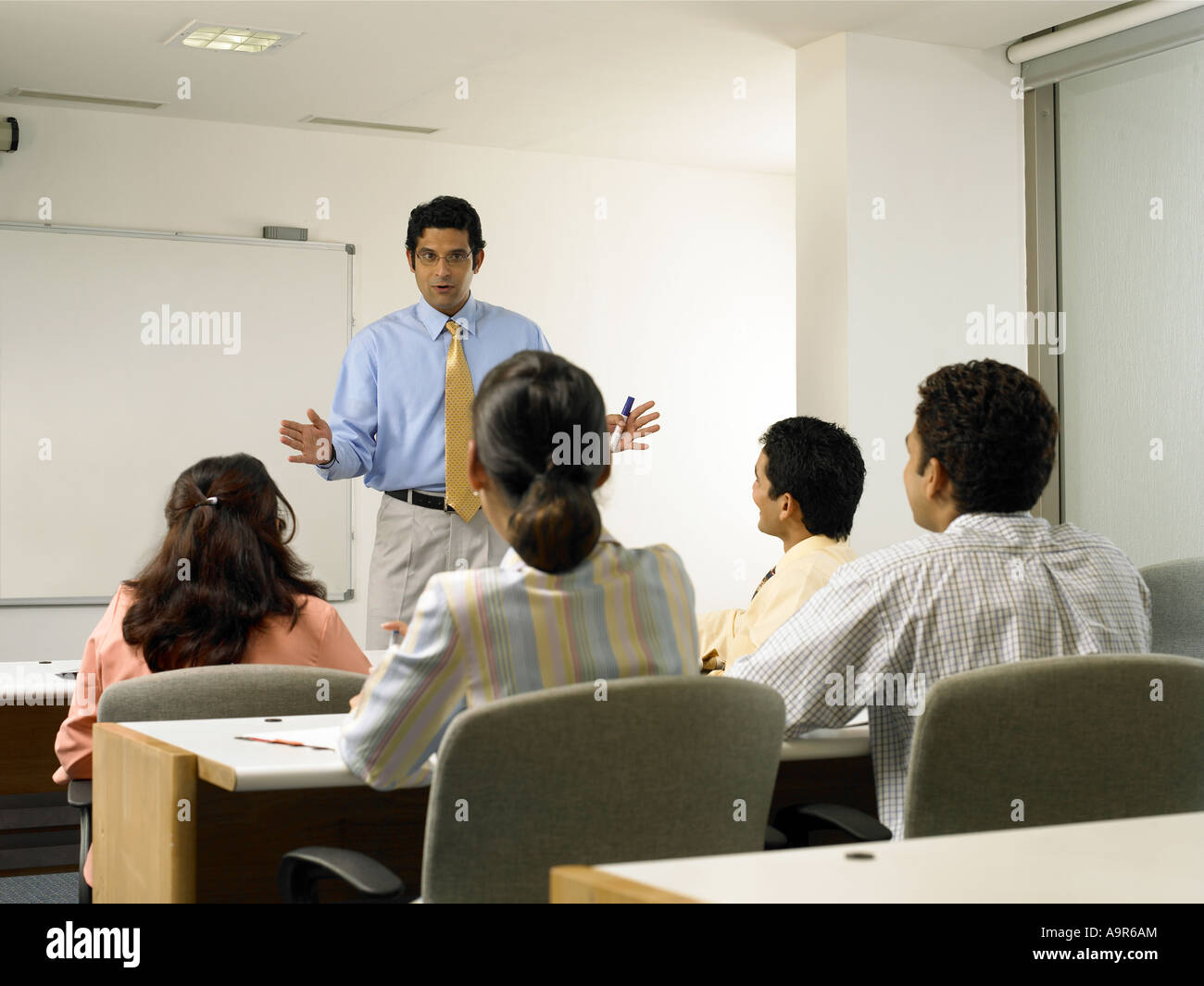 Young professionals in a training class Stock Photo - Alamy