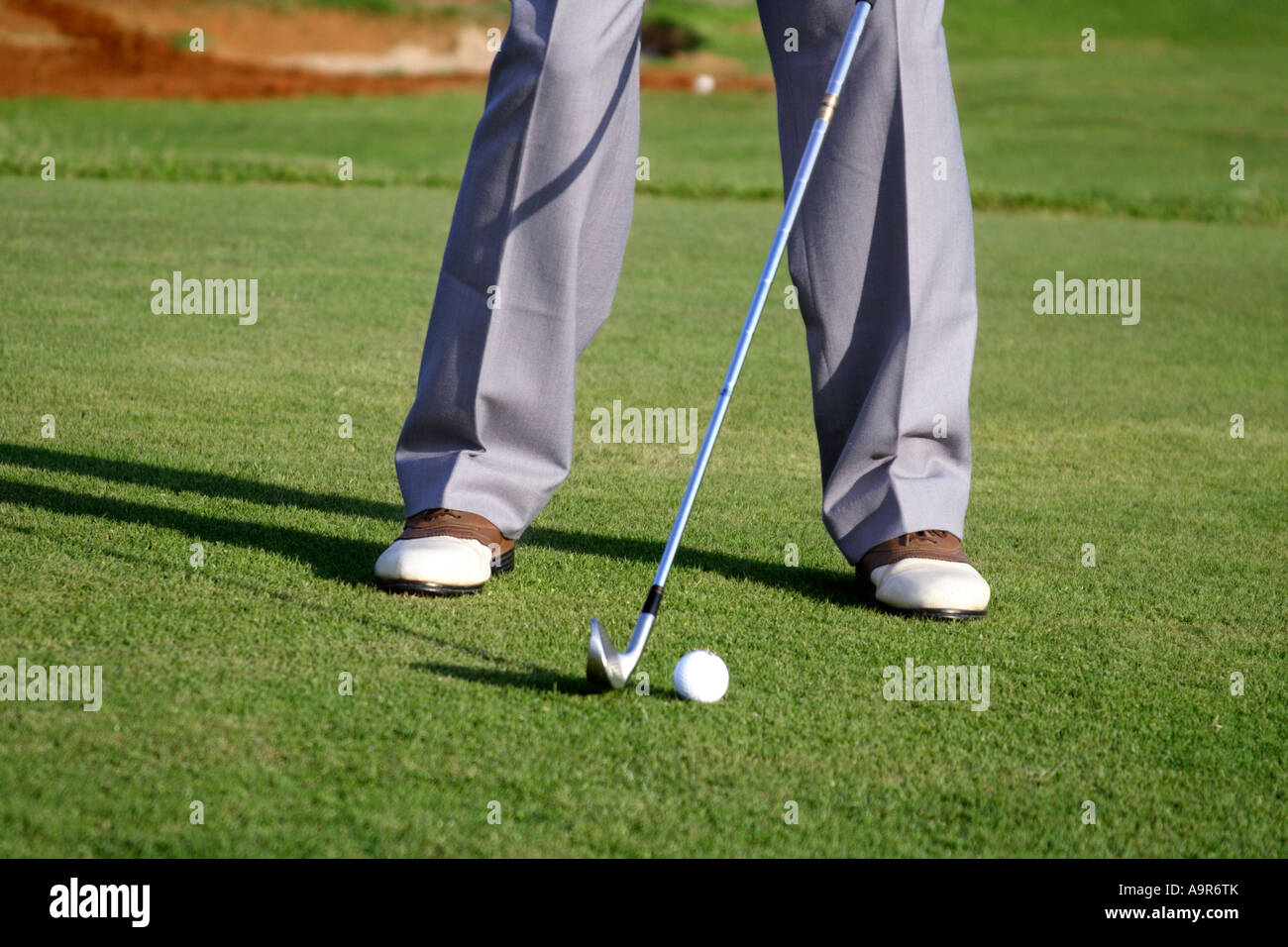 A person playing golf Stock Photo - Alamy
