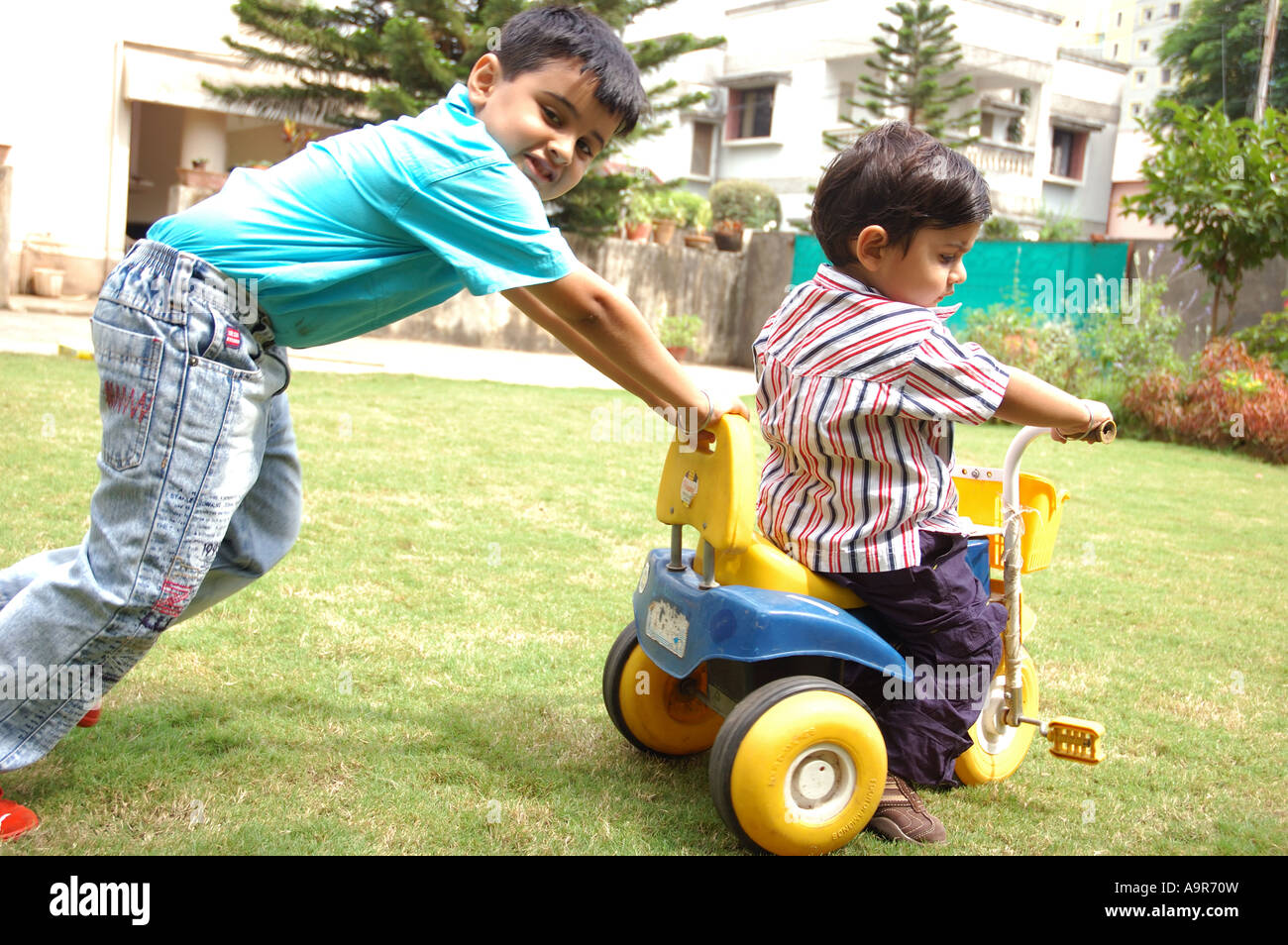 Two brothers playing together Stock Photo - Alamy