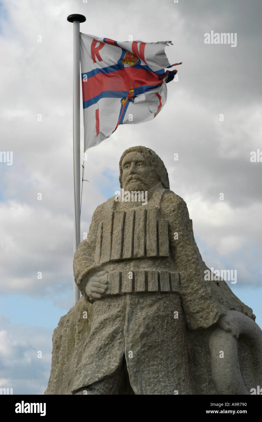 RNLI flag over liveboat man statue at the National Memorial Arboretum ...