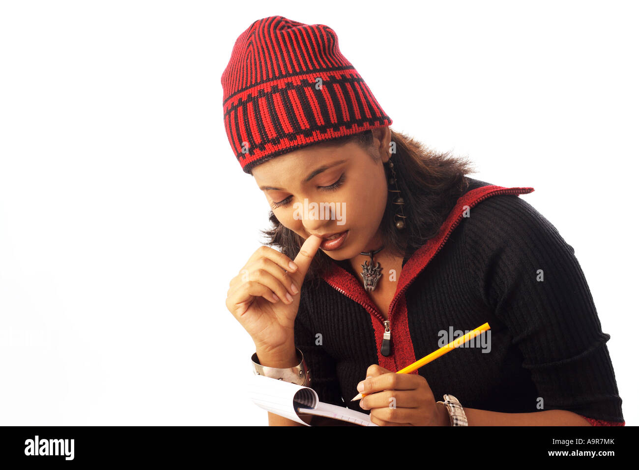 Adult indian woman writing hi-res stock photography and images - Alamy