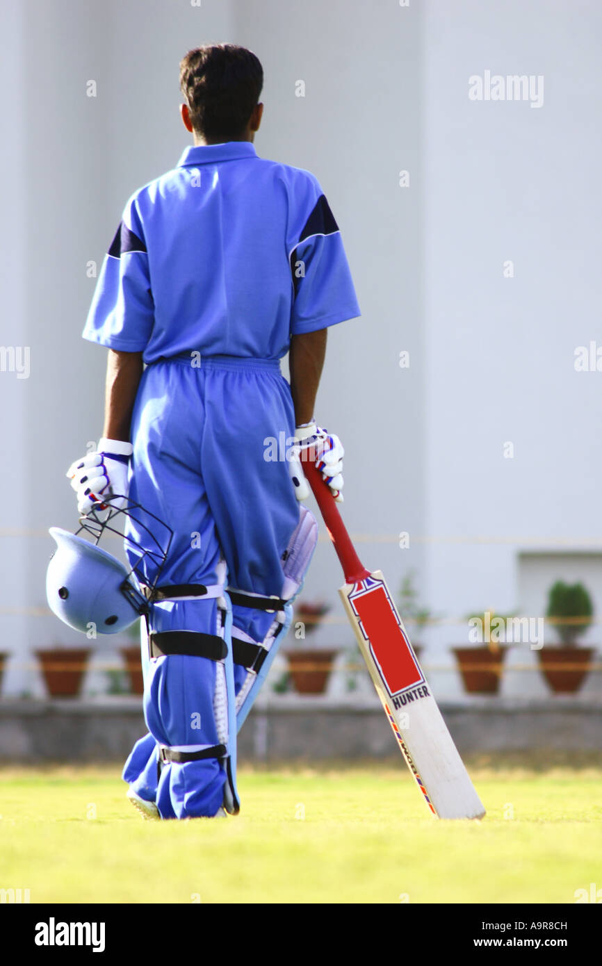 Indian man holding cricket bat hi-res stock photography and images - Alamy
