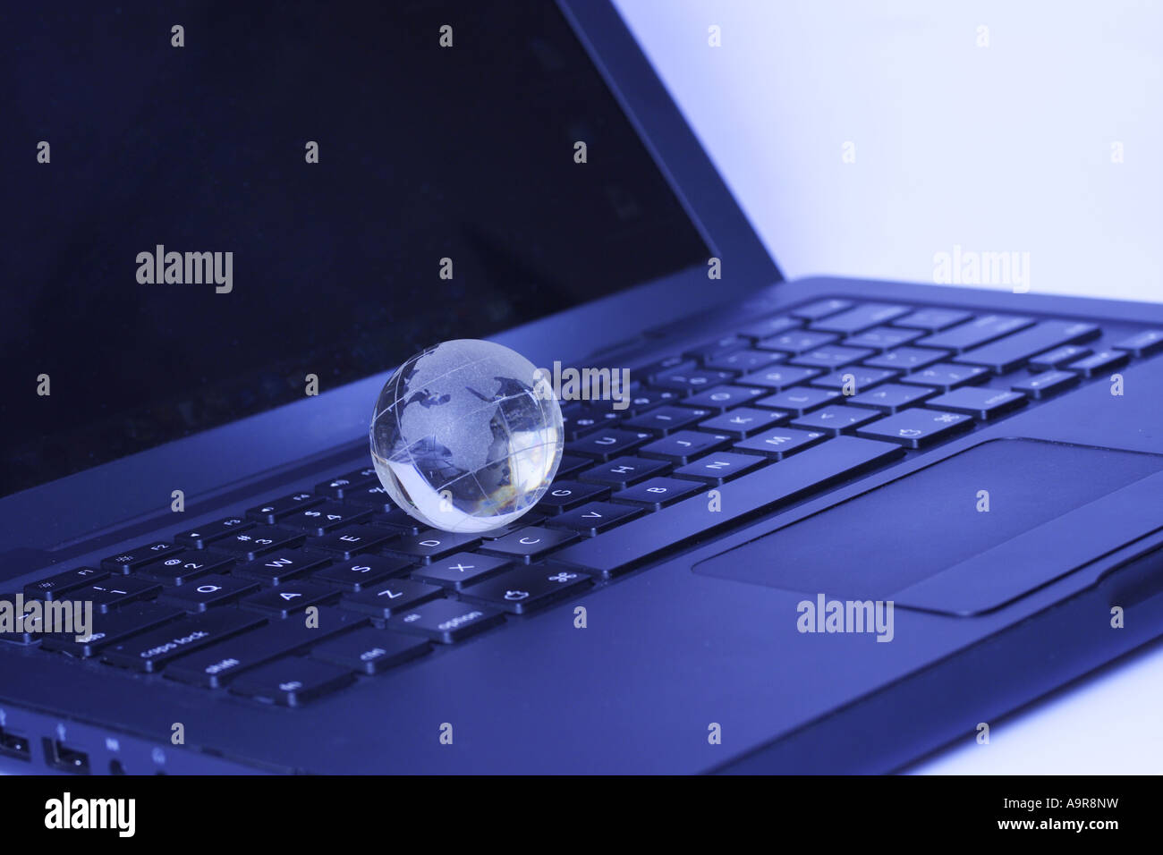 Globe development technology laptop hi-res stock photography and images ...