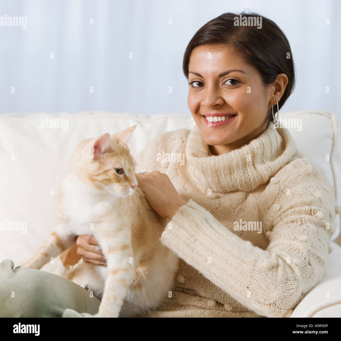 Indian woman holding cat hi-res stock photography and images - Alamy