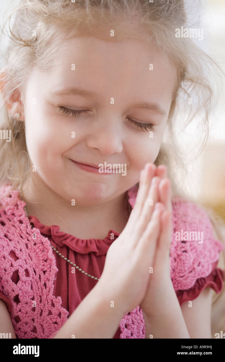 Child girl praying pleading hi-res stock photography and images - Alamy