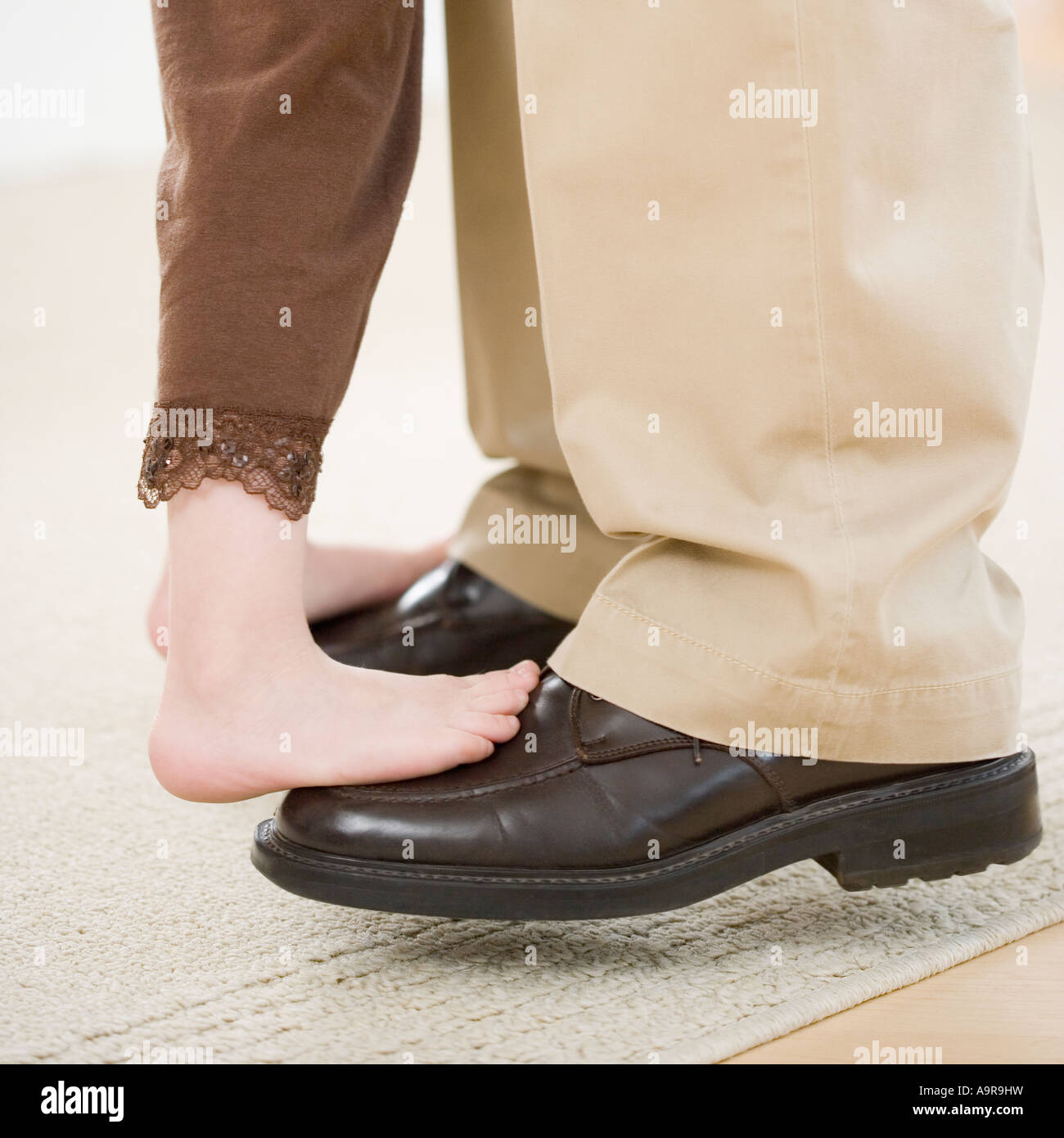 Girl raising foot hi-res stock photography and images - Alamy