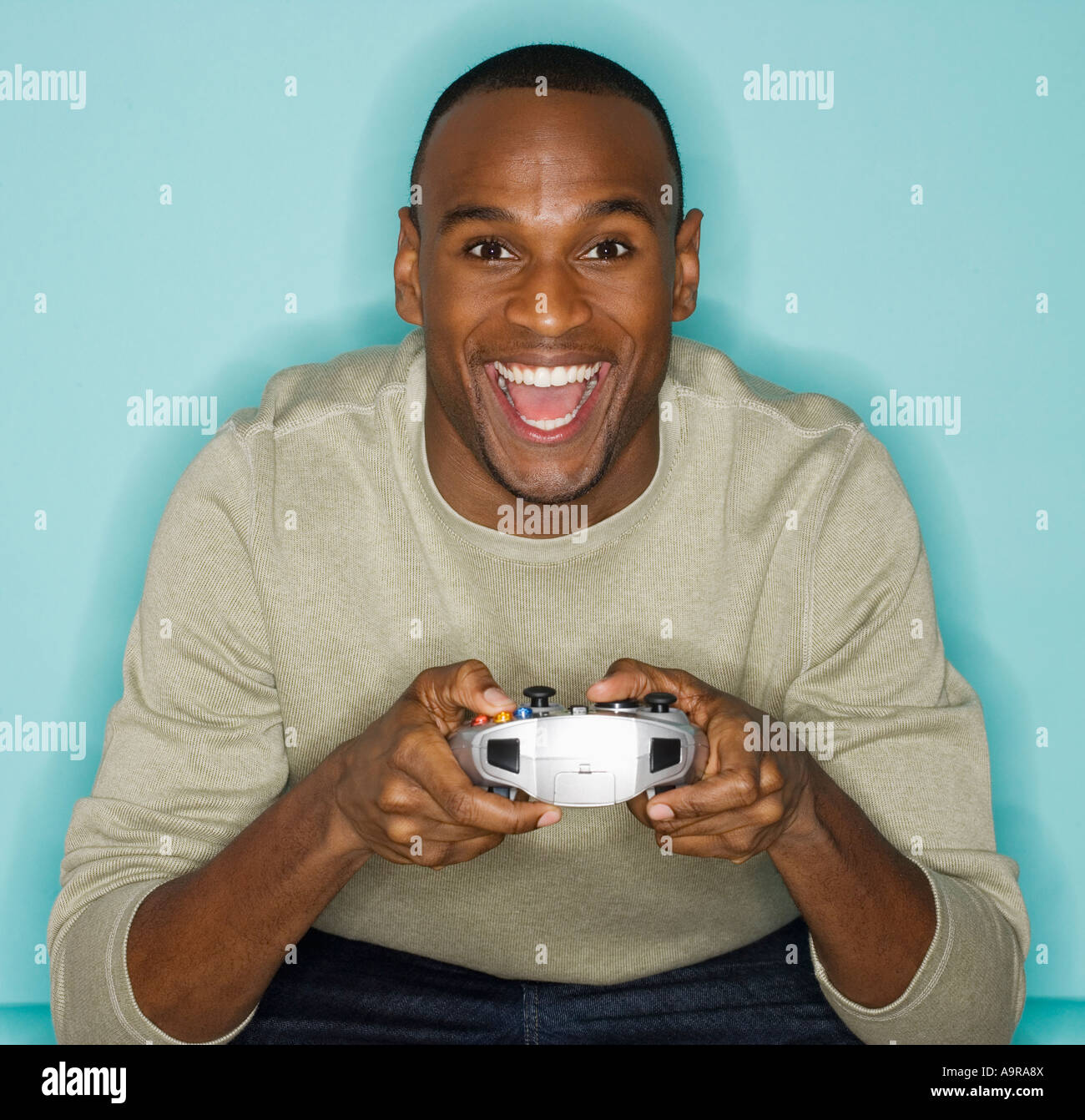 Man playing video games Stock Photo - Alamy