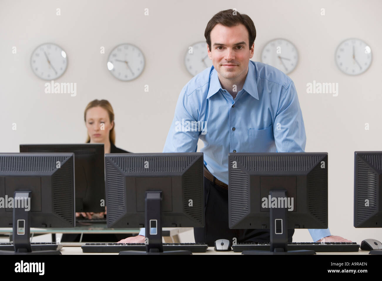 Men row computers hi-res stock photography and images - Alamy
