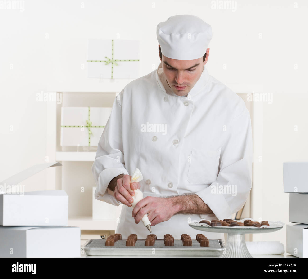 Male pastry chef in kitchen Stock Photo - Alamy