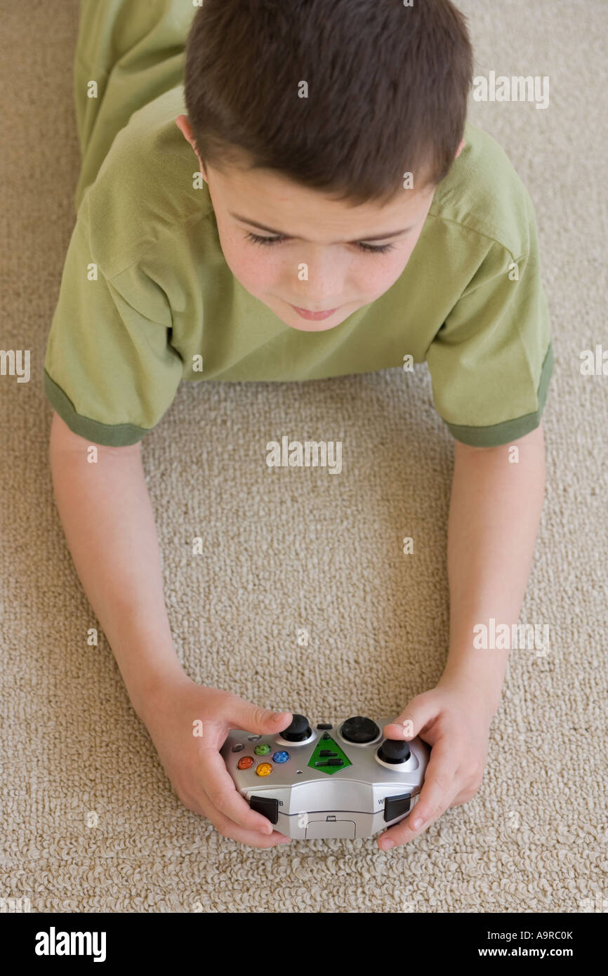 Boy playing video games Stock Photo - Alamy