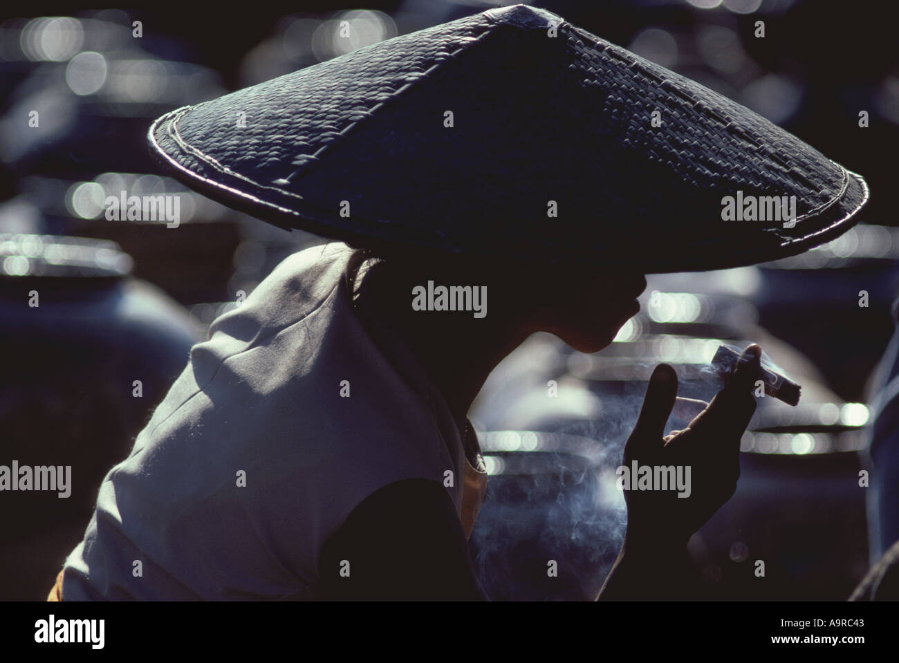 Woman smoking cheroot Stock Photo - Alamy