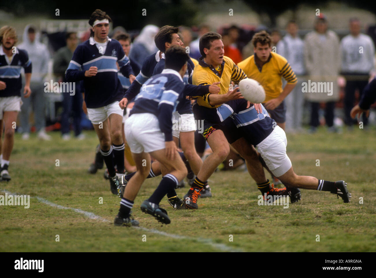 Group of male rugby players in game Stock Photo - Alamy