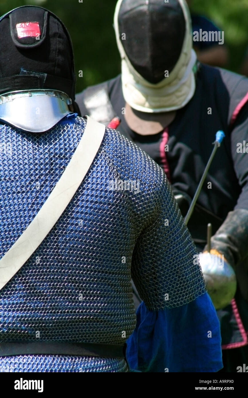 Two men fencing Stock Photo - Alamy
