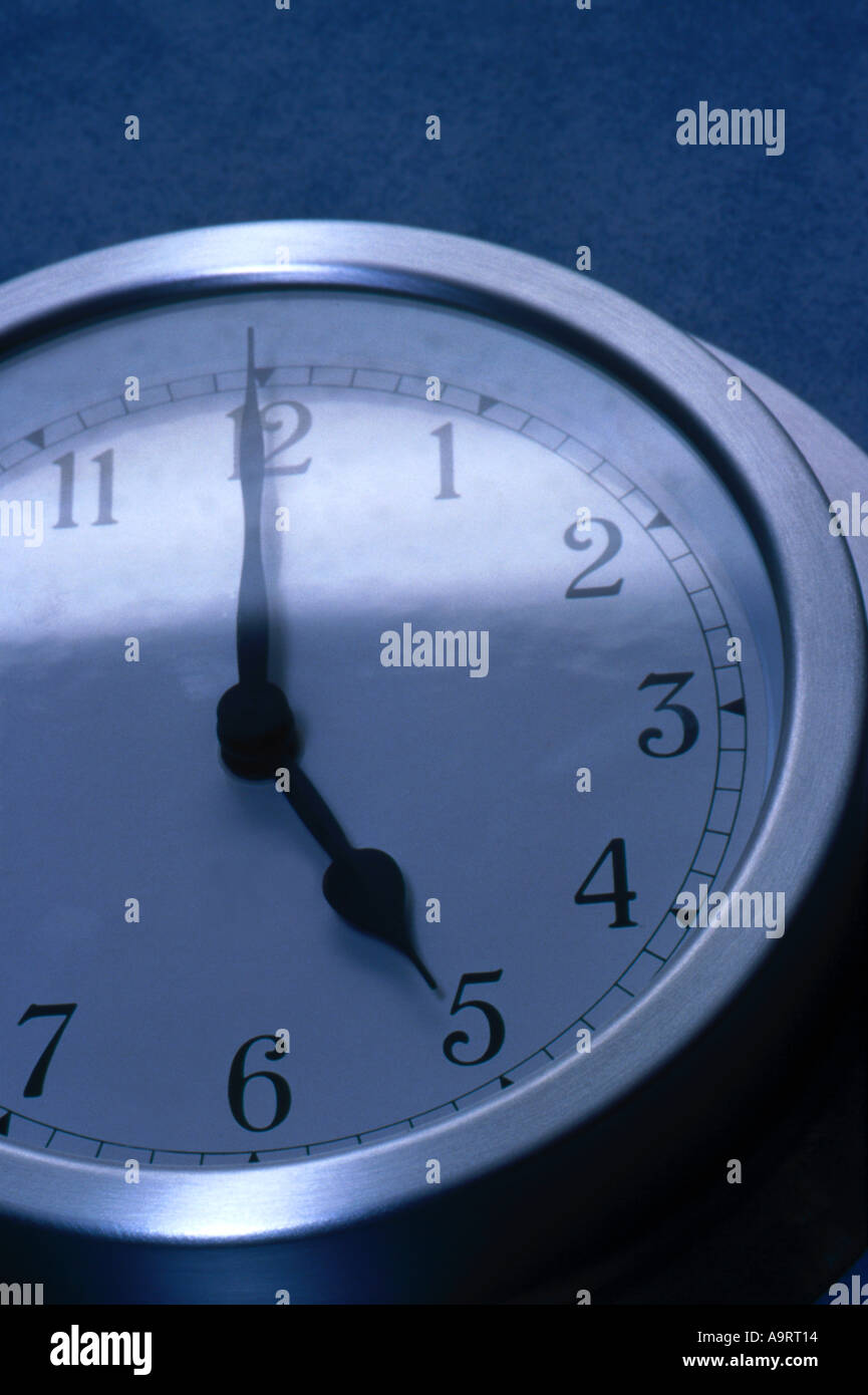 Clock at 5 O clock Stock Photo - Alamy