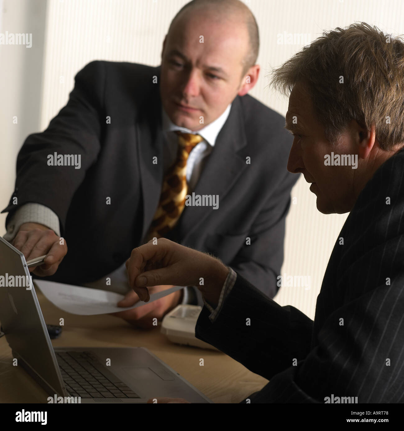 Two men in the office Stock Photo - Alamy