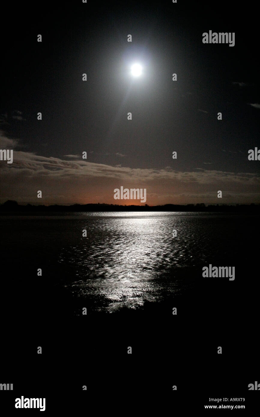 Full moon reflecting on water at night hi-res stock photography and ...