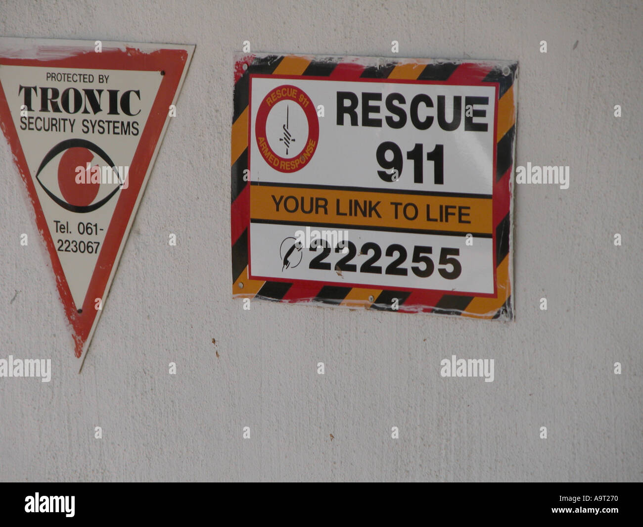 Security signs in Windhoek Namibia Stock Photo - Alamy