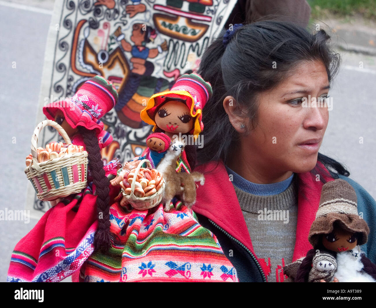 Peruvian woman selling goods on the railtrack between Cusco and Machu ...