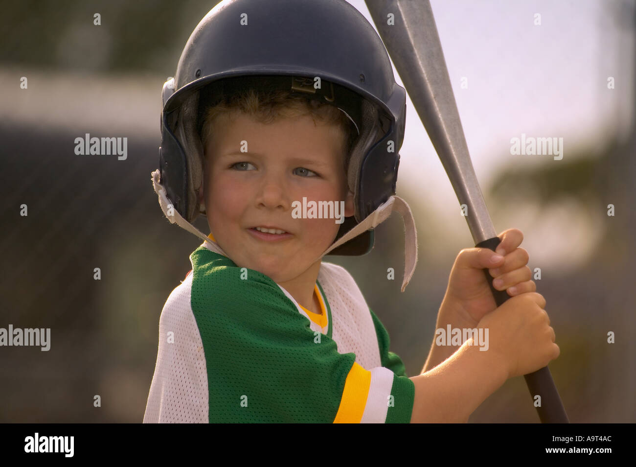 Boy wearing baseball uniform hi-res stock photography and images - Alamy