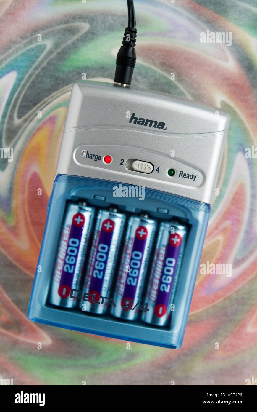 Rechargable batteries in charger hi-res stock photography and images ...