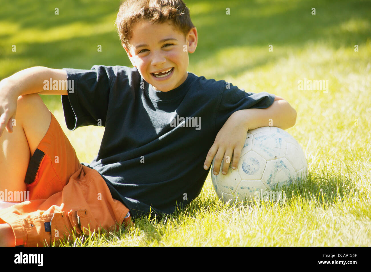 Seated sitting football soccer hi-res stock photography and images - Alamy