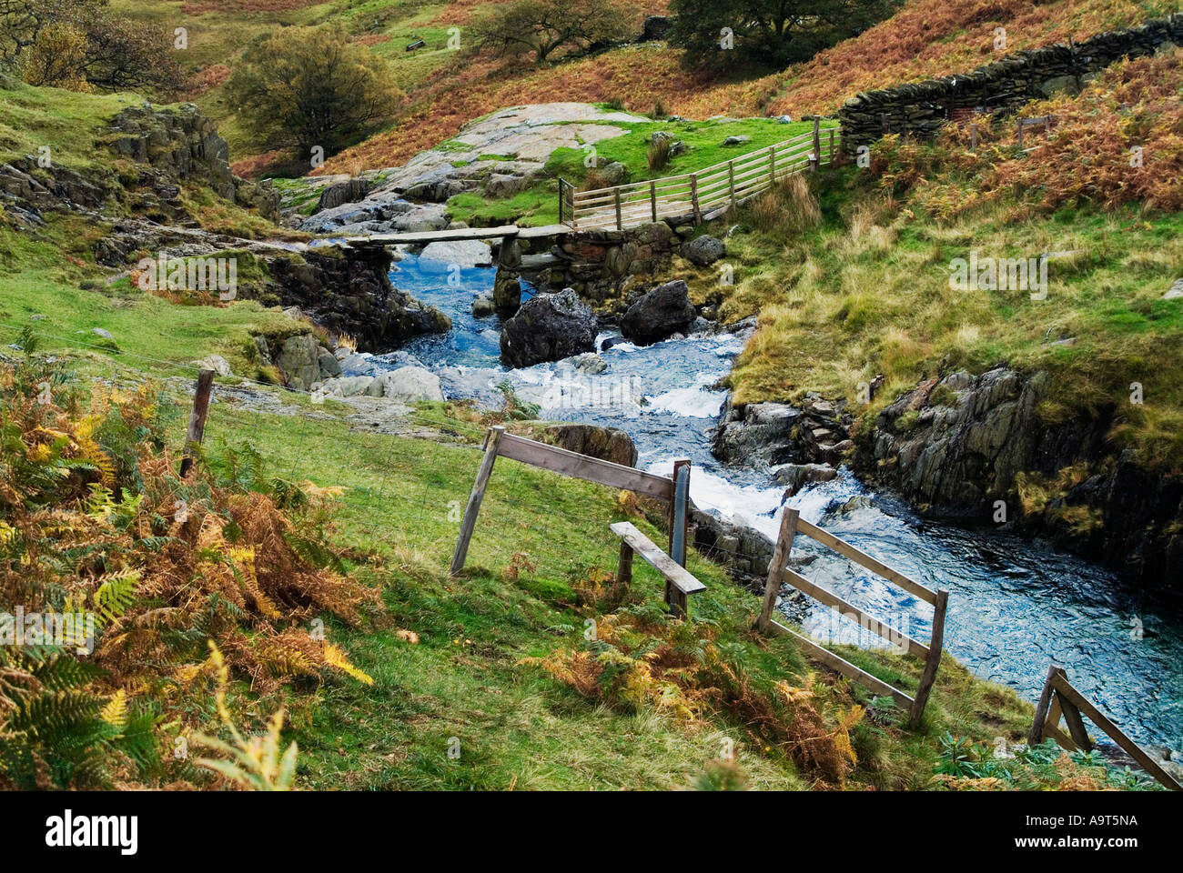 Footbridge over a river on the Watkin Path which leads up Snowdon in ...