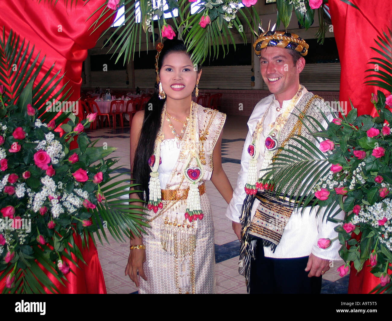 A UK Groom with his Thai Bride after their wedding Stock Photo - Alamy