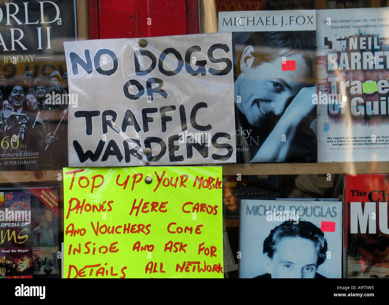 No Dogs or Traffic Warden sign in a bookshop window in Manchester ...