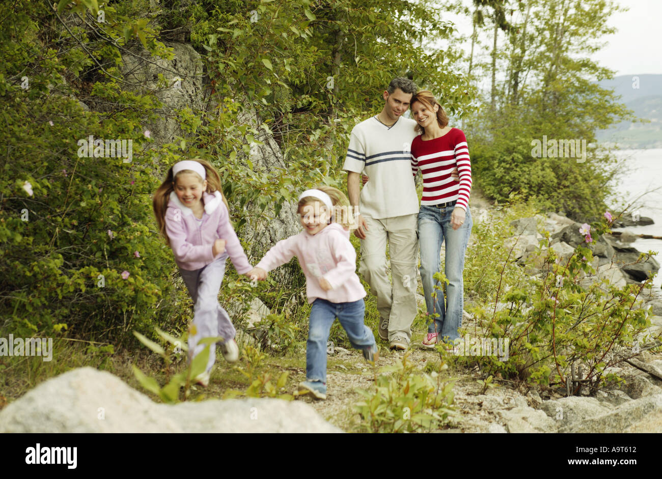 Small family with a child goes for a walk hi-res stock photography and ...