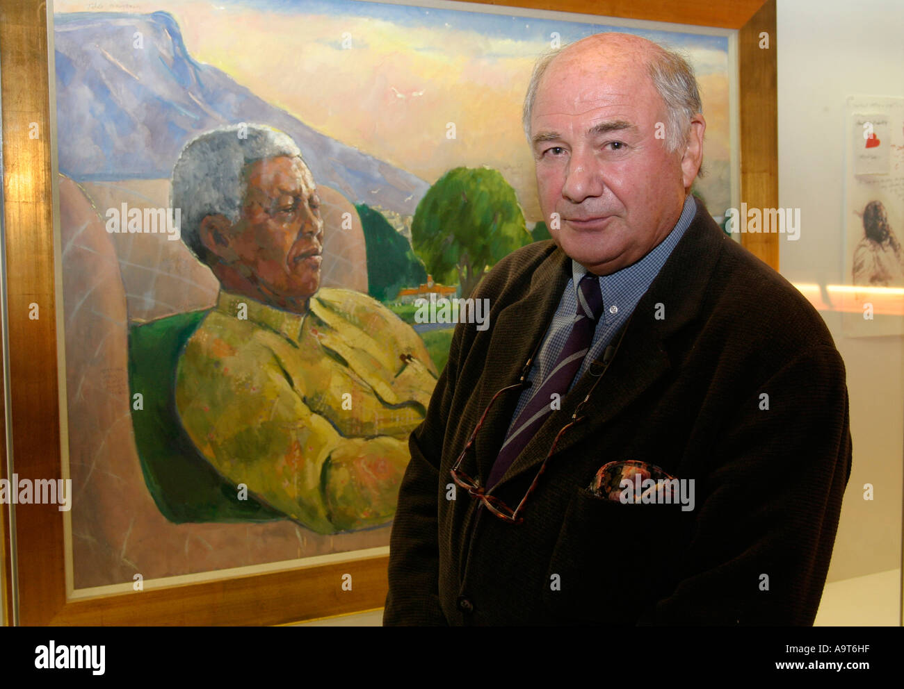 The Artist Harold Riley is pictured with his portrait of Nelson Mandela ...