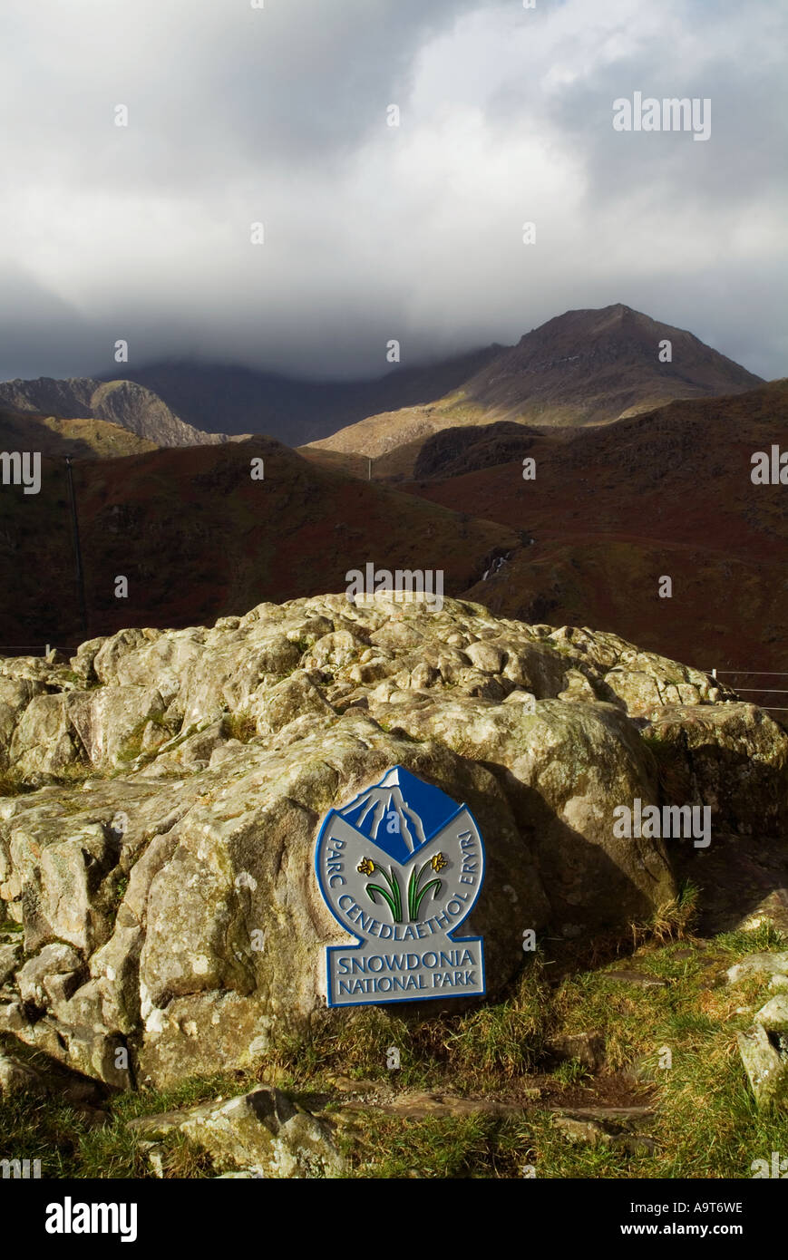 Snowdonia National Park sign with the Snowdon Horseshoe behind shrouded ...