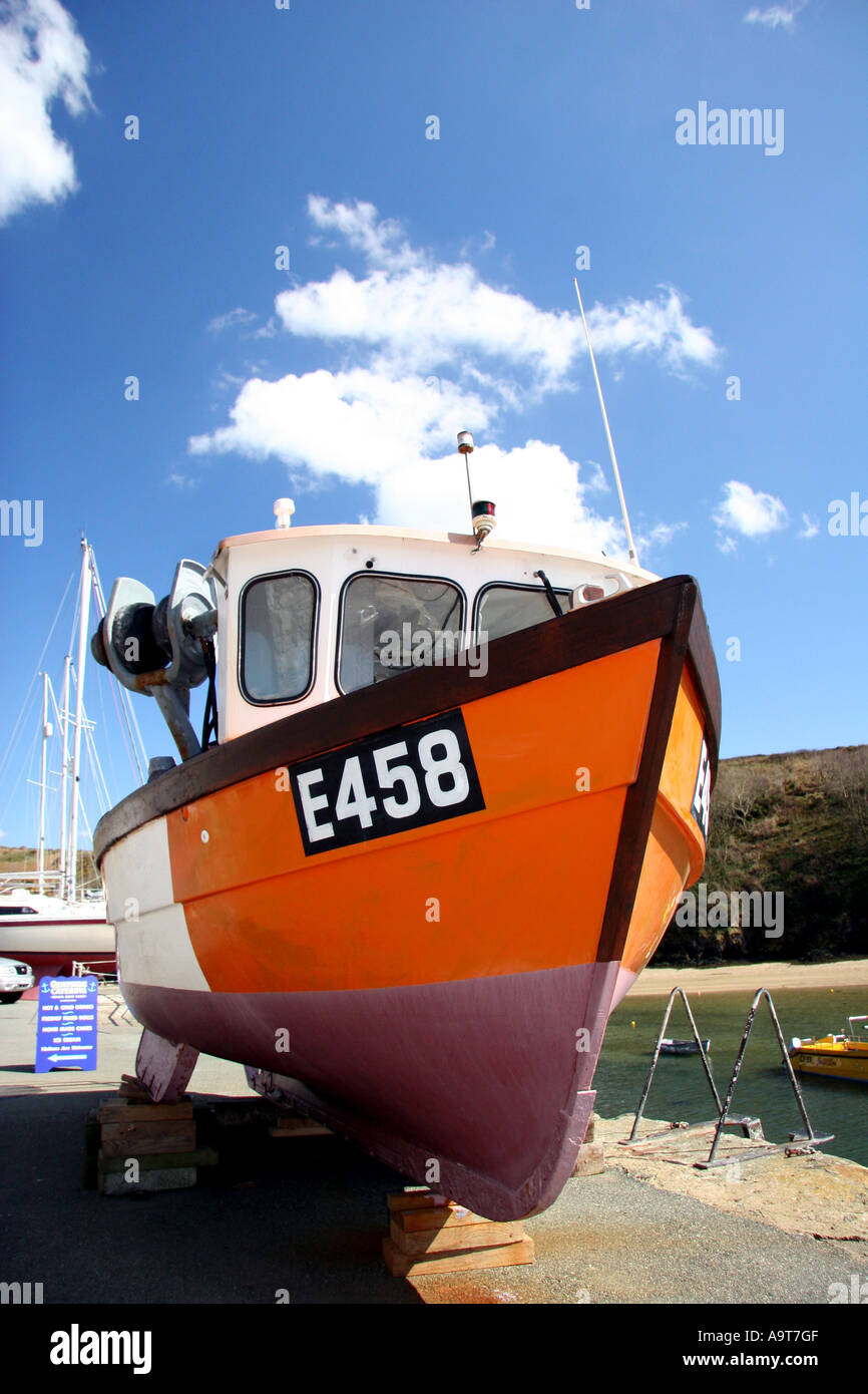 Orange fishing boat E458 Stock Photo - Alamy