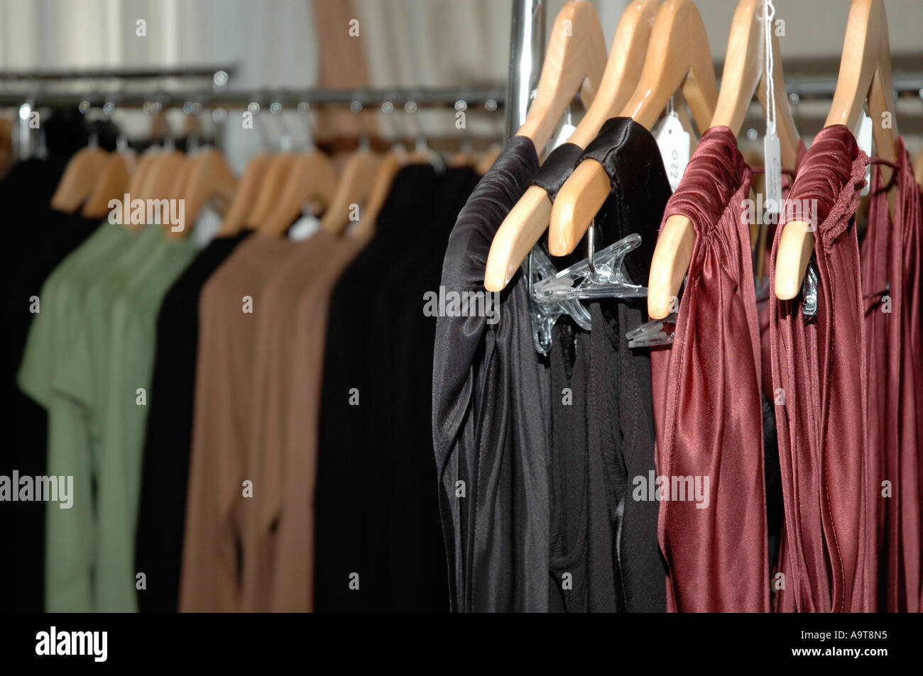 Clothes on hangers at a fashion event Stock Photo - Alamy