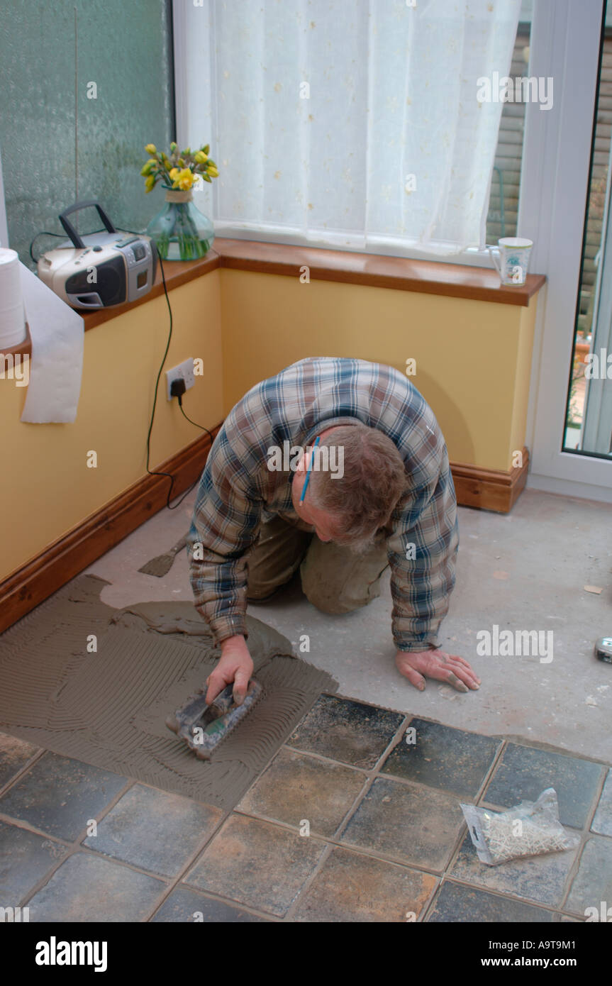 Fitting Floor Tiles Stock Photo - Alamy
