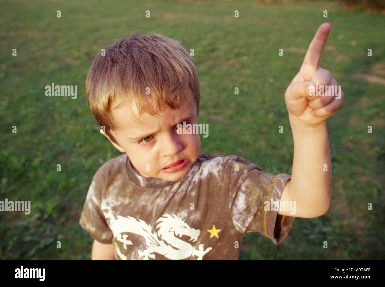 young child gesturing finger angry boy point mad Stock Photo - Alamy