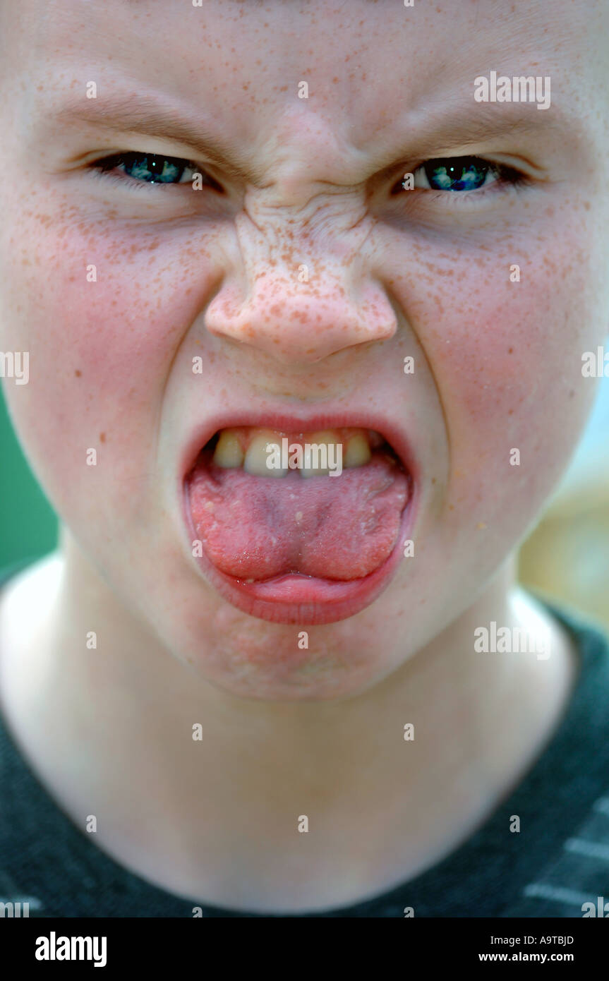 Boy Making Faces Stock Photo - Alamy