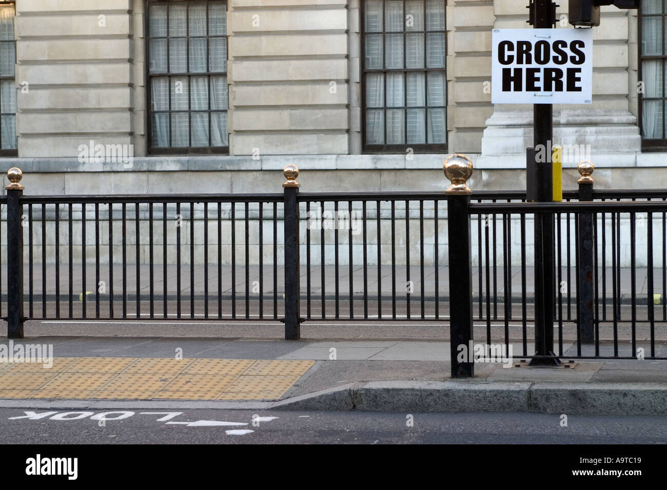 Cross Here Sign Stock Photo - Alamy