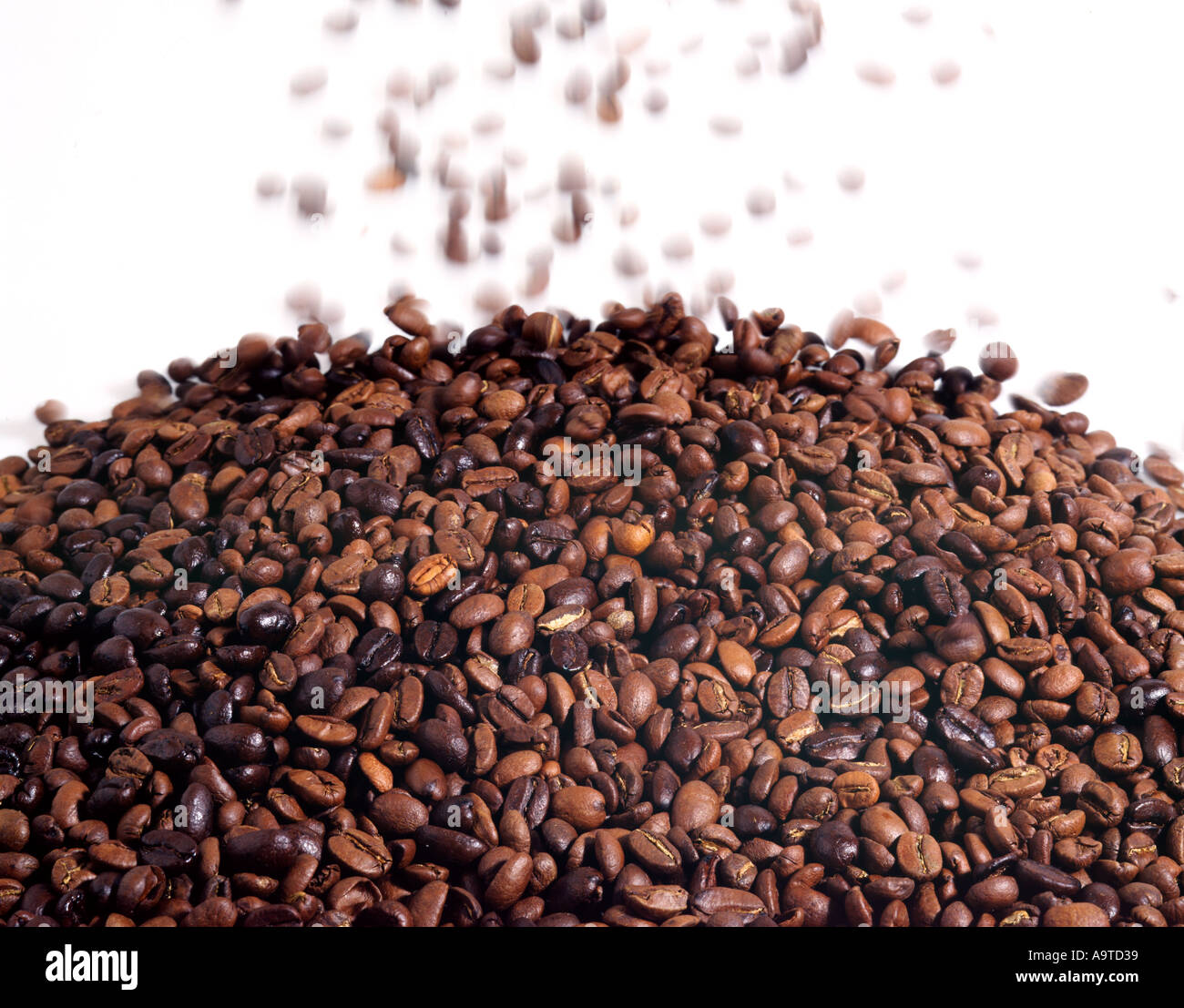 Coffee beans falling Stock Photo - Alamy