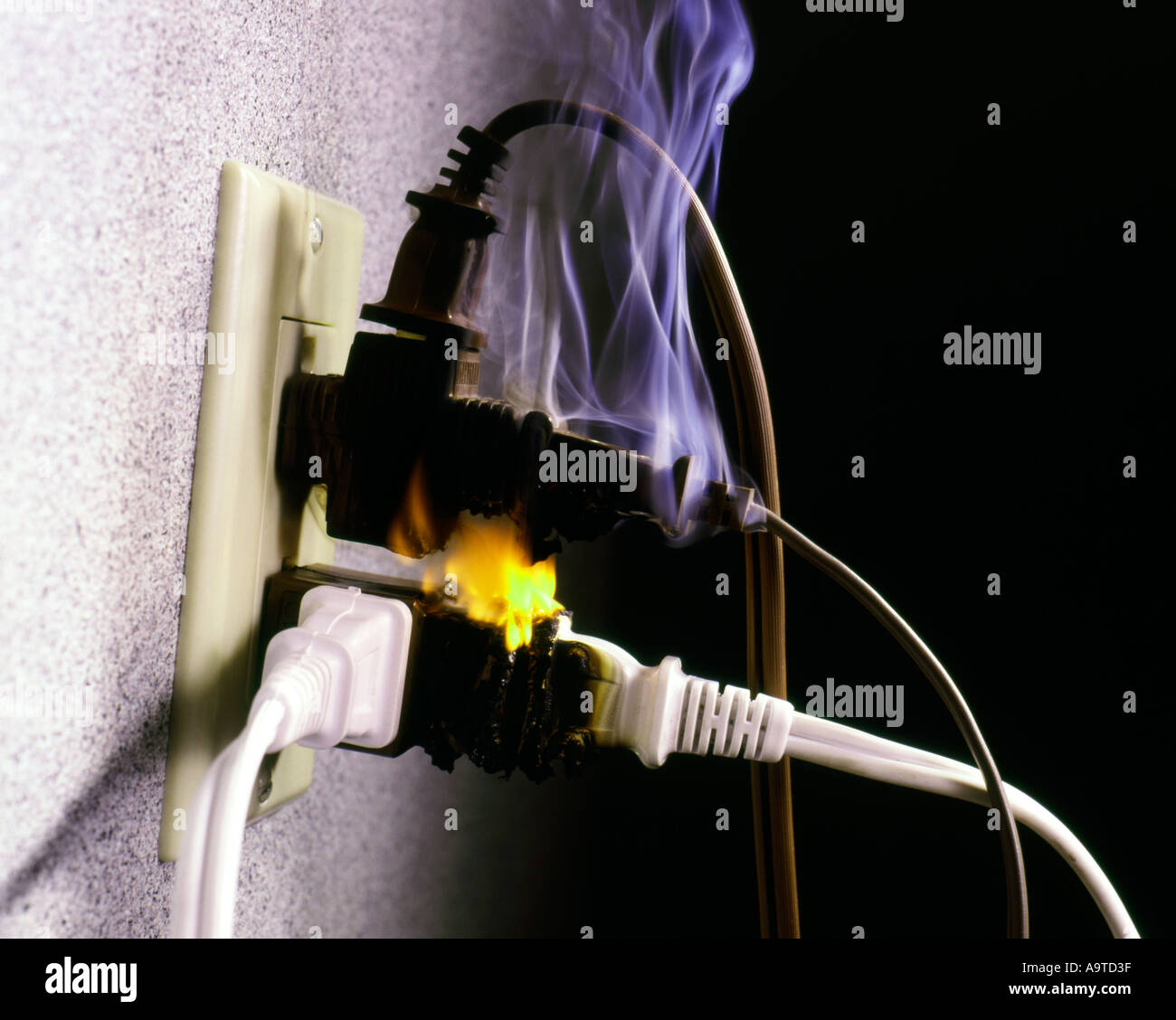 Concept Danger Wires on fire Stock Photo - Alamy