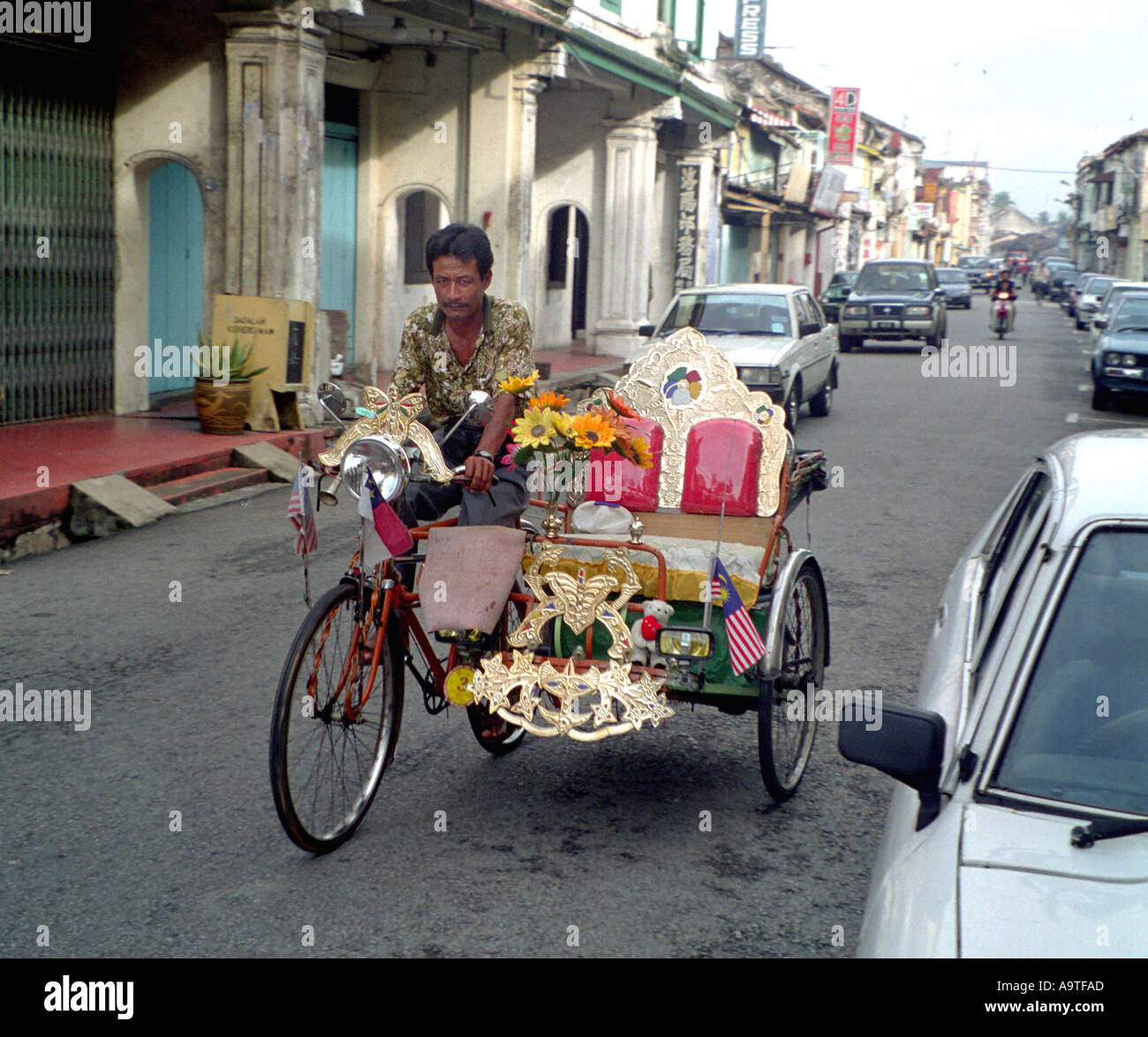 Rickshaw driver Melaka Malaysia Stock Photo - Alamy