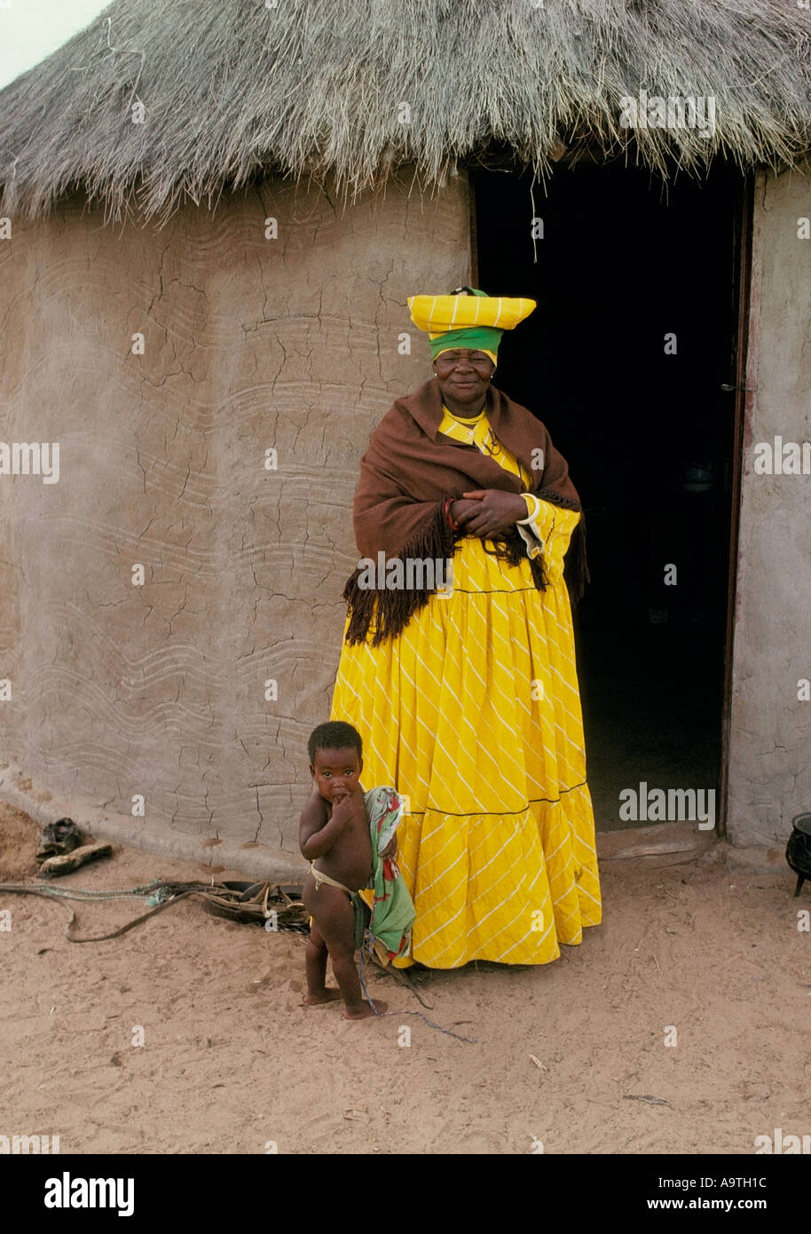 Herero woman and child wearing traditional clothes and headdress ...